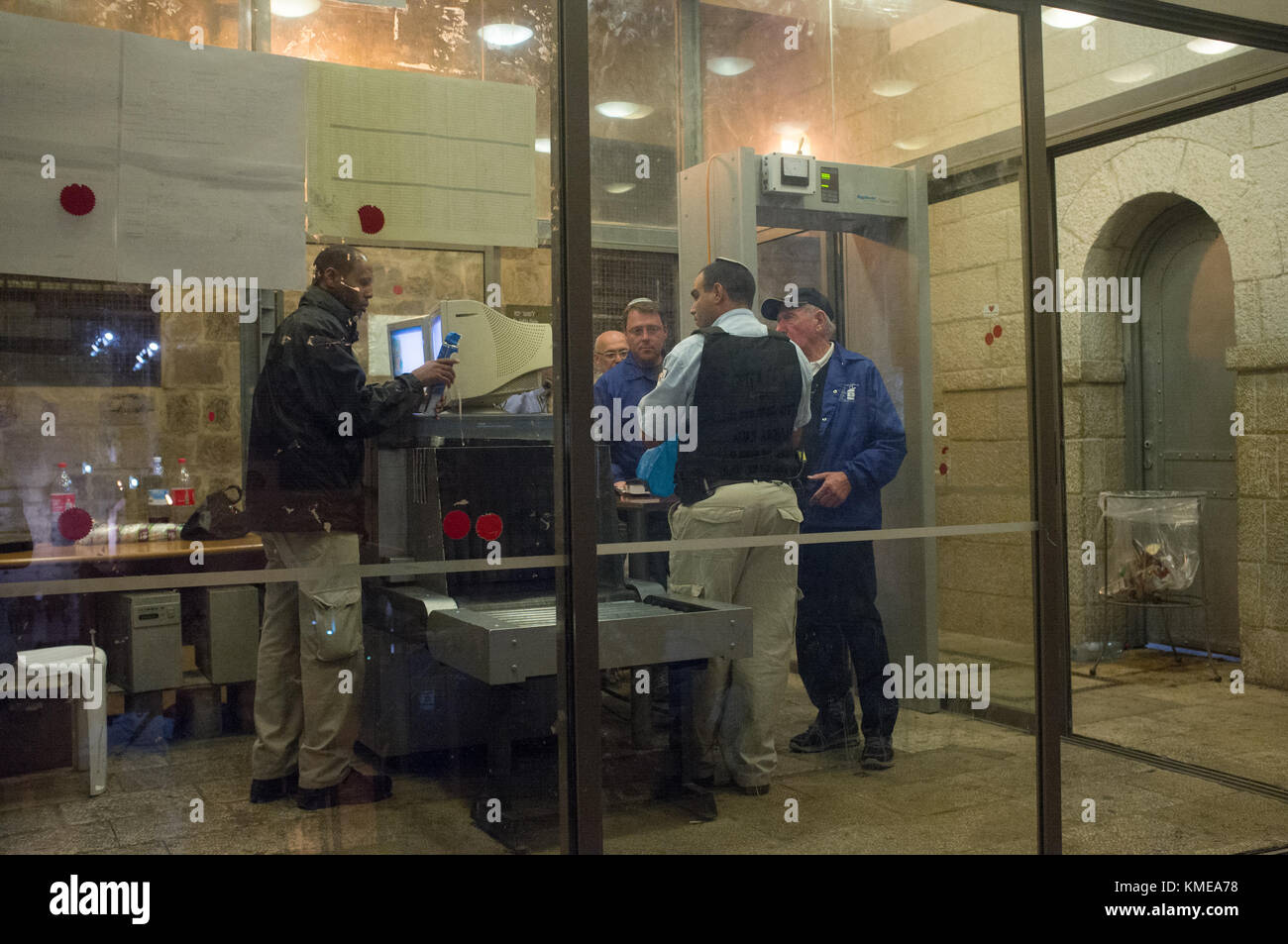 Security staff checking passports and identities at the Western Wall ...