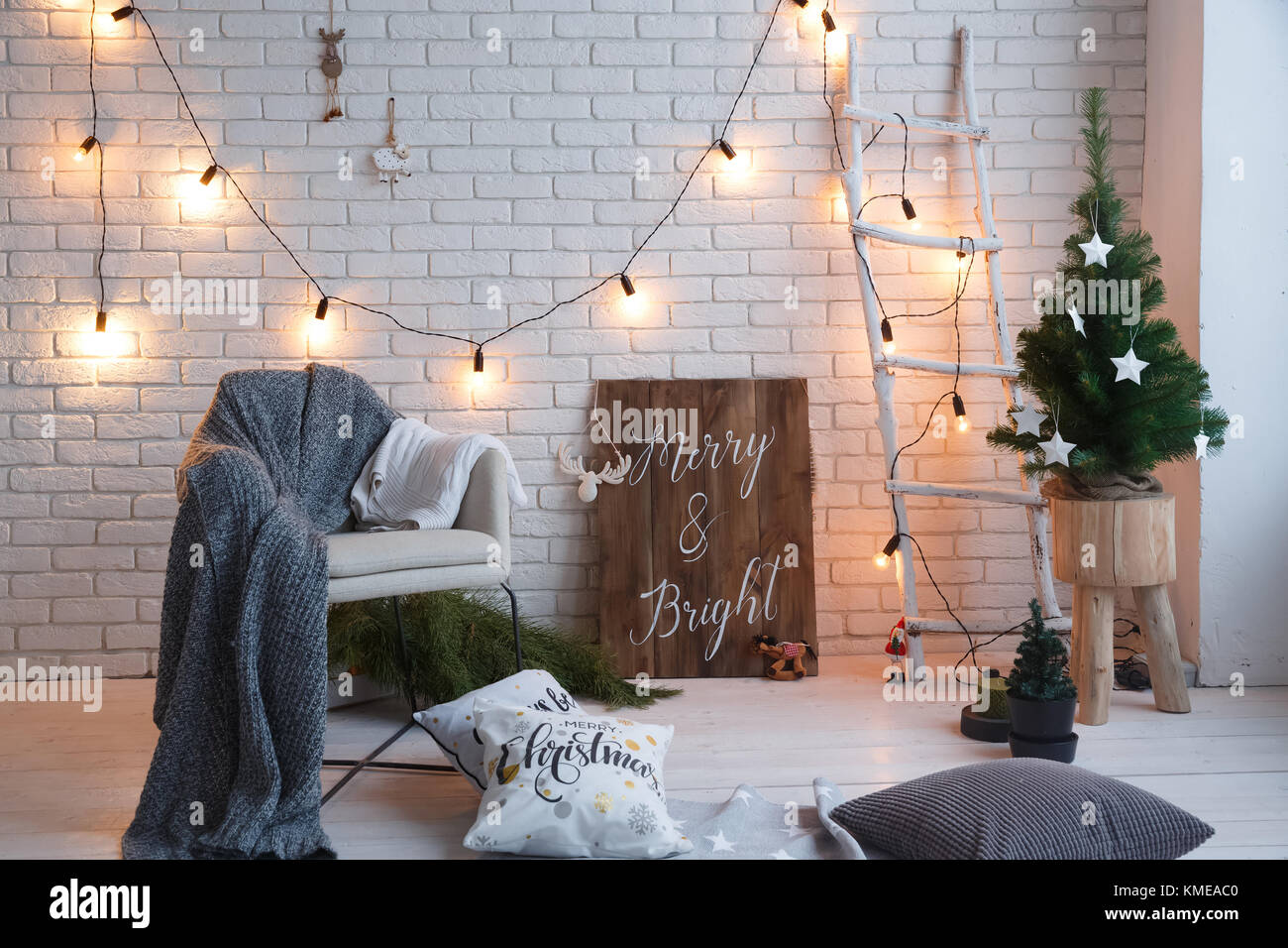 Cozy Christmas decoration background in loft interior Stock Photo - Alamy
