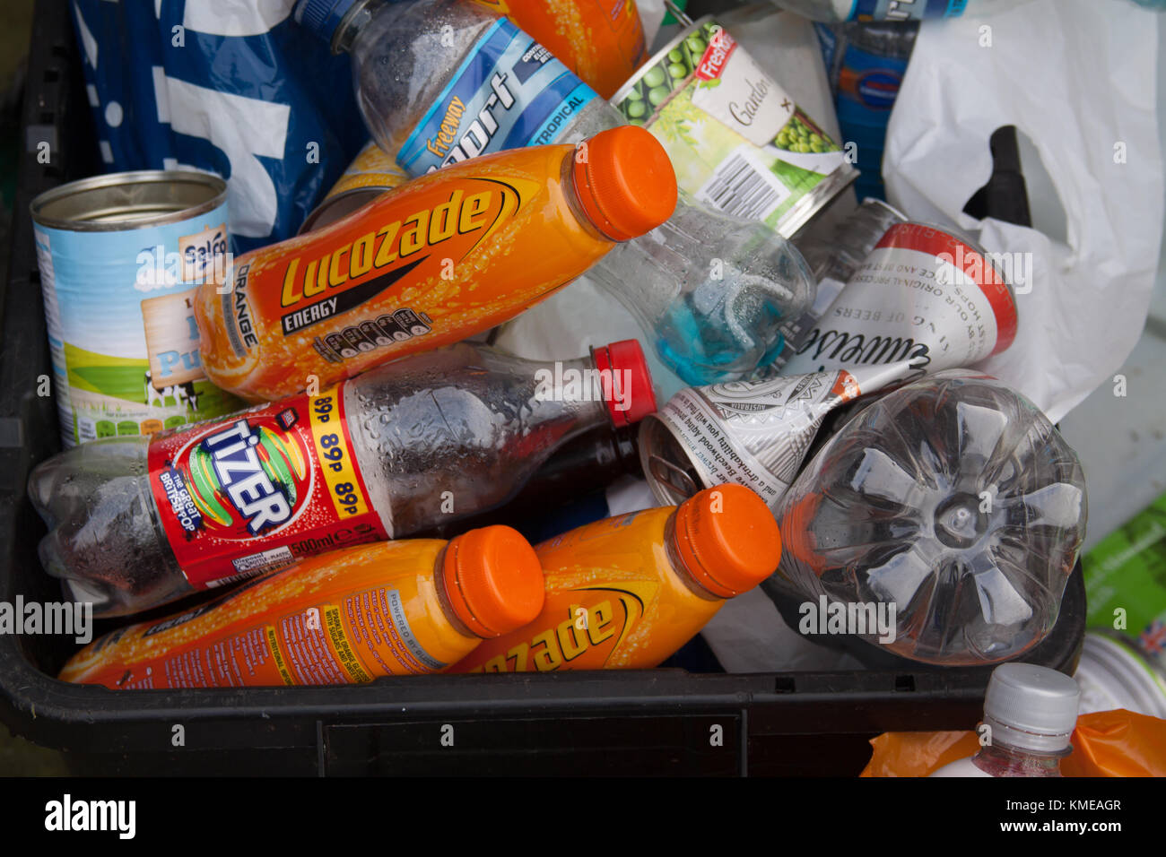 Platsic bottles and metal cans in household recycling box. UK Stock ...
