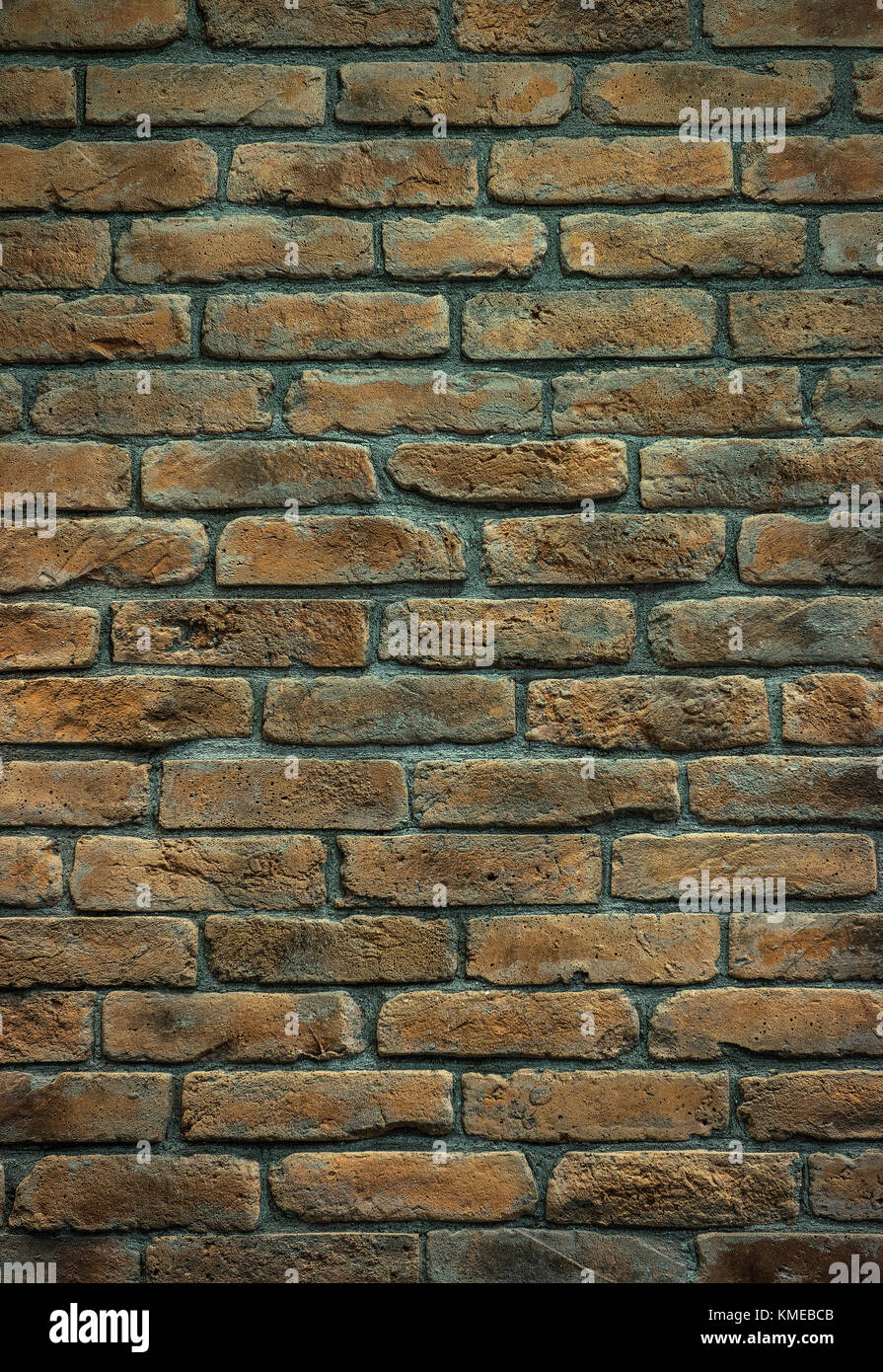 Brick wall background vertical view Stock Photo - Alamy