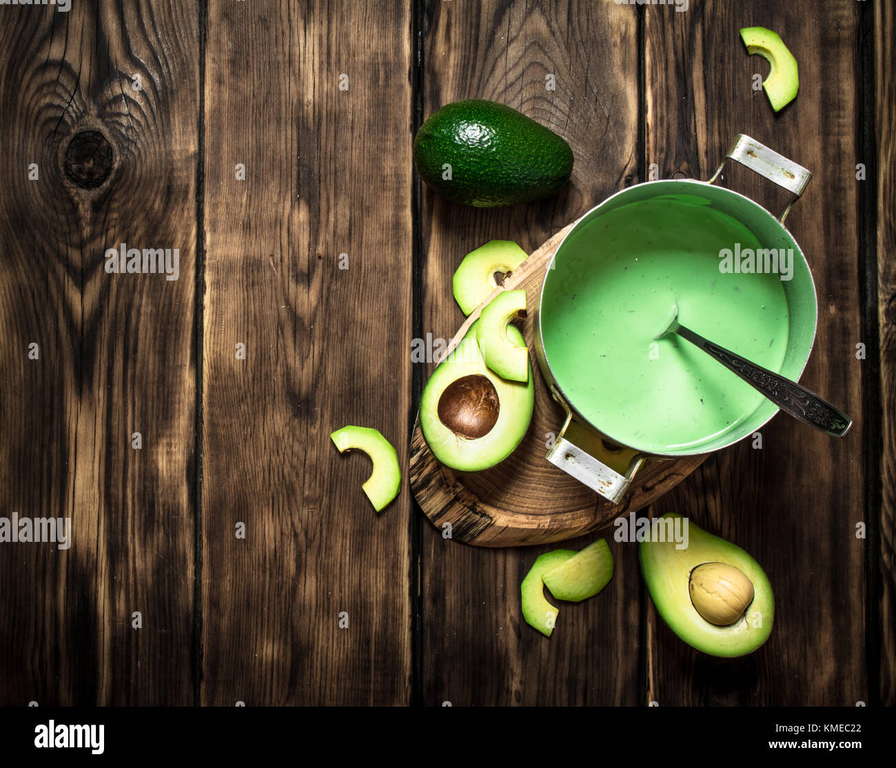 Fresh avocado sauce. On a wooden background Stock Photo - Alamy