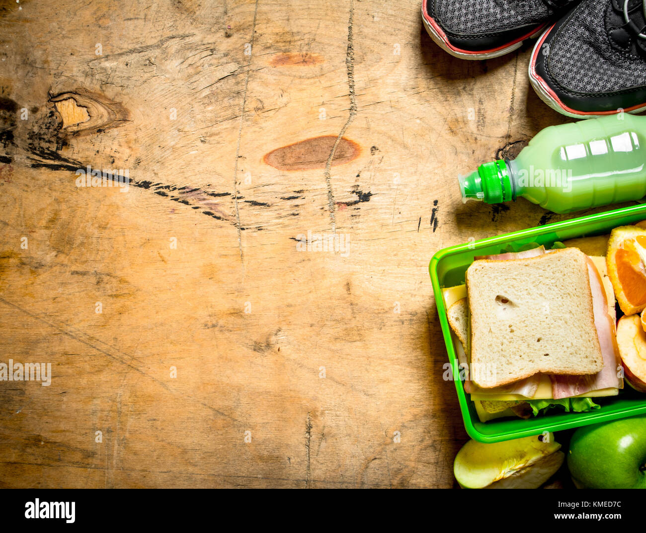 Morning set. Sandwiches with ham and cheese, a milkshake and fruit ...