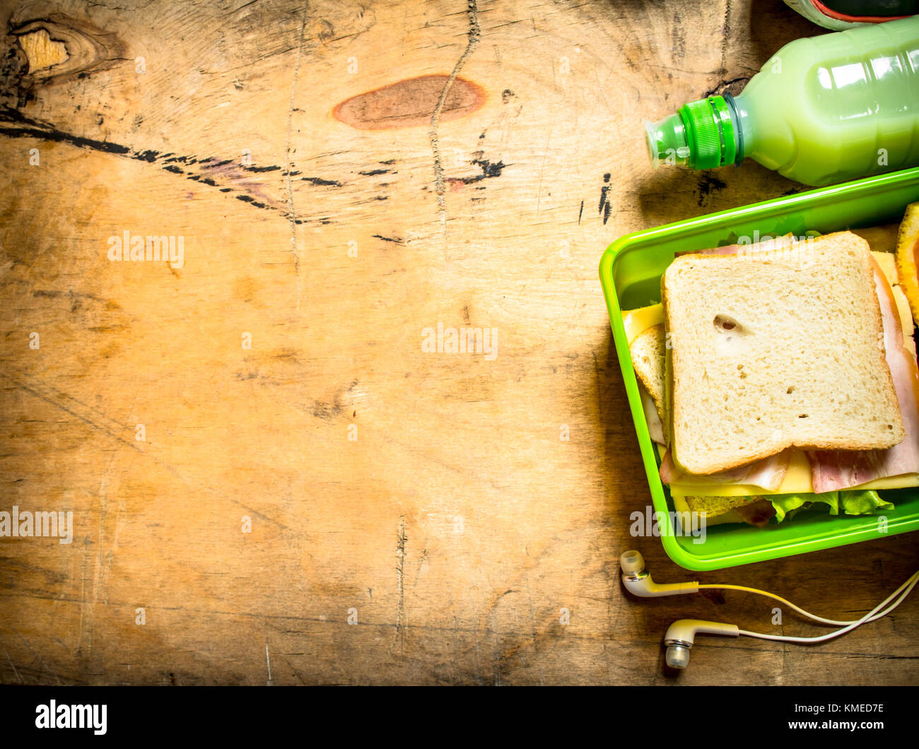 Morning set. Sandwiches with ham and cheese, a milkshake and fruit ...