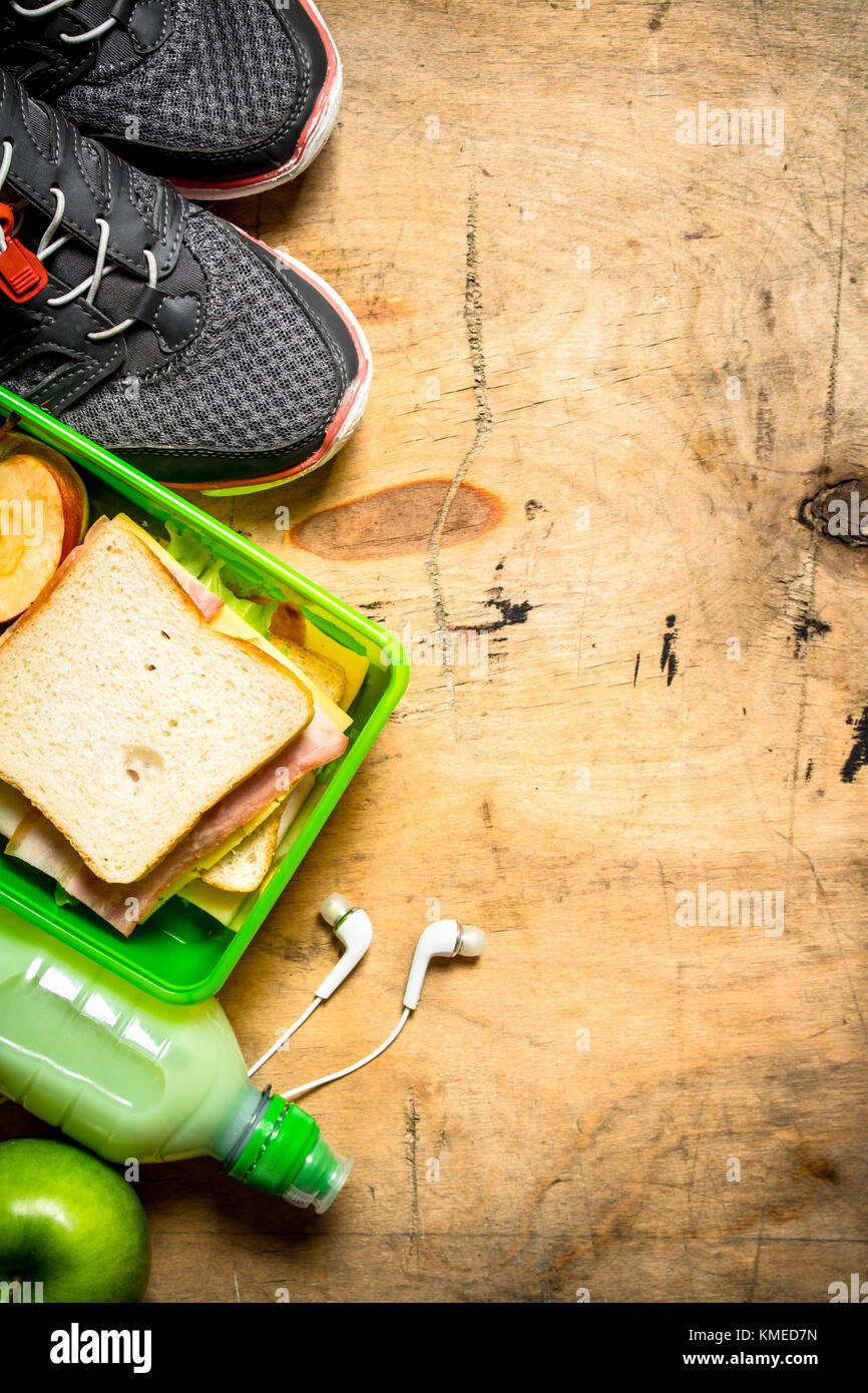 Morning set. Sandwiches with ham and cheese, a milkshake and fruit ...