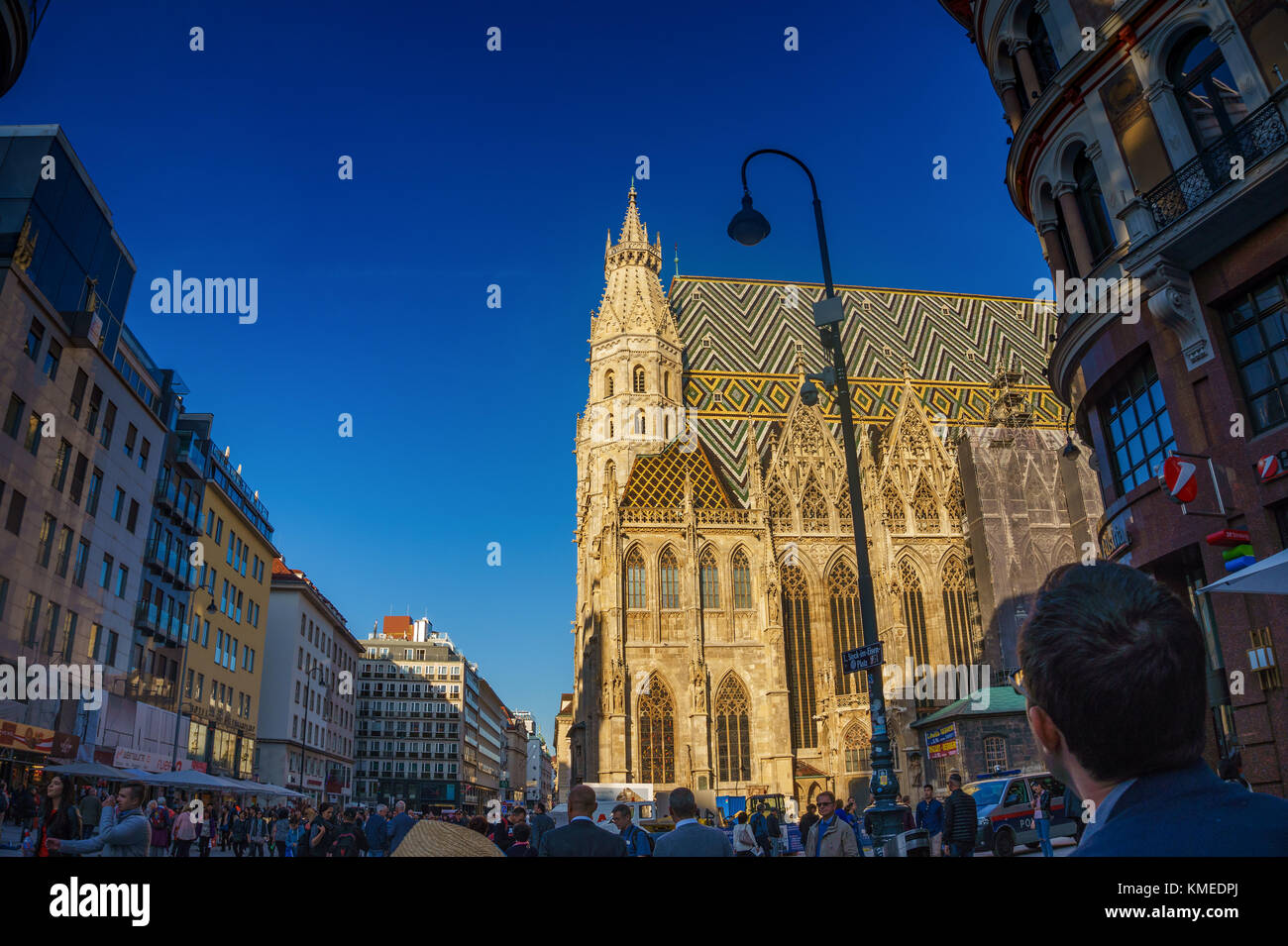 Walking by the crowded streets in the city center of Vienna, Austria ...