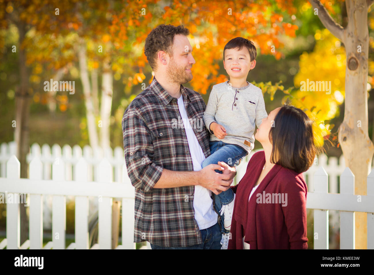 Outdoor Portrait of Mixed Race Chinese and Caucasian Parents and Child ...