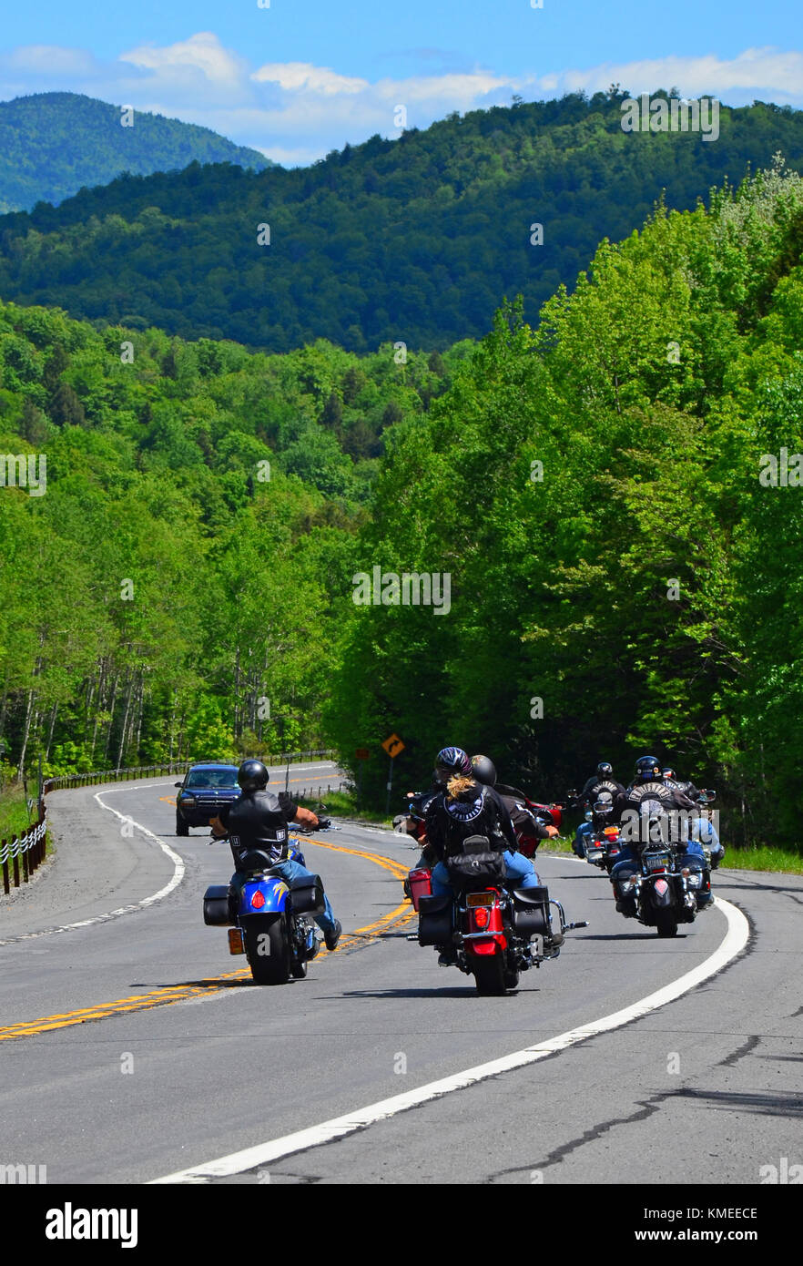 Group of motorcycles touring the Adirondack Mountains, NY in summer ...