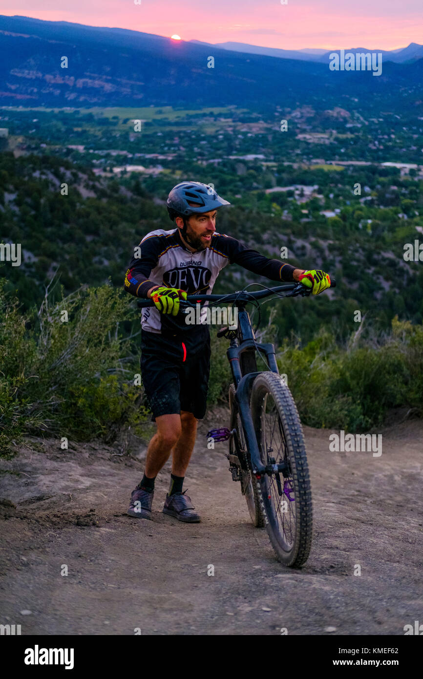 Man walking with helmet hi-res stock photography and images - Alamy