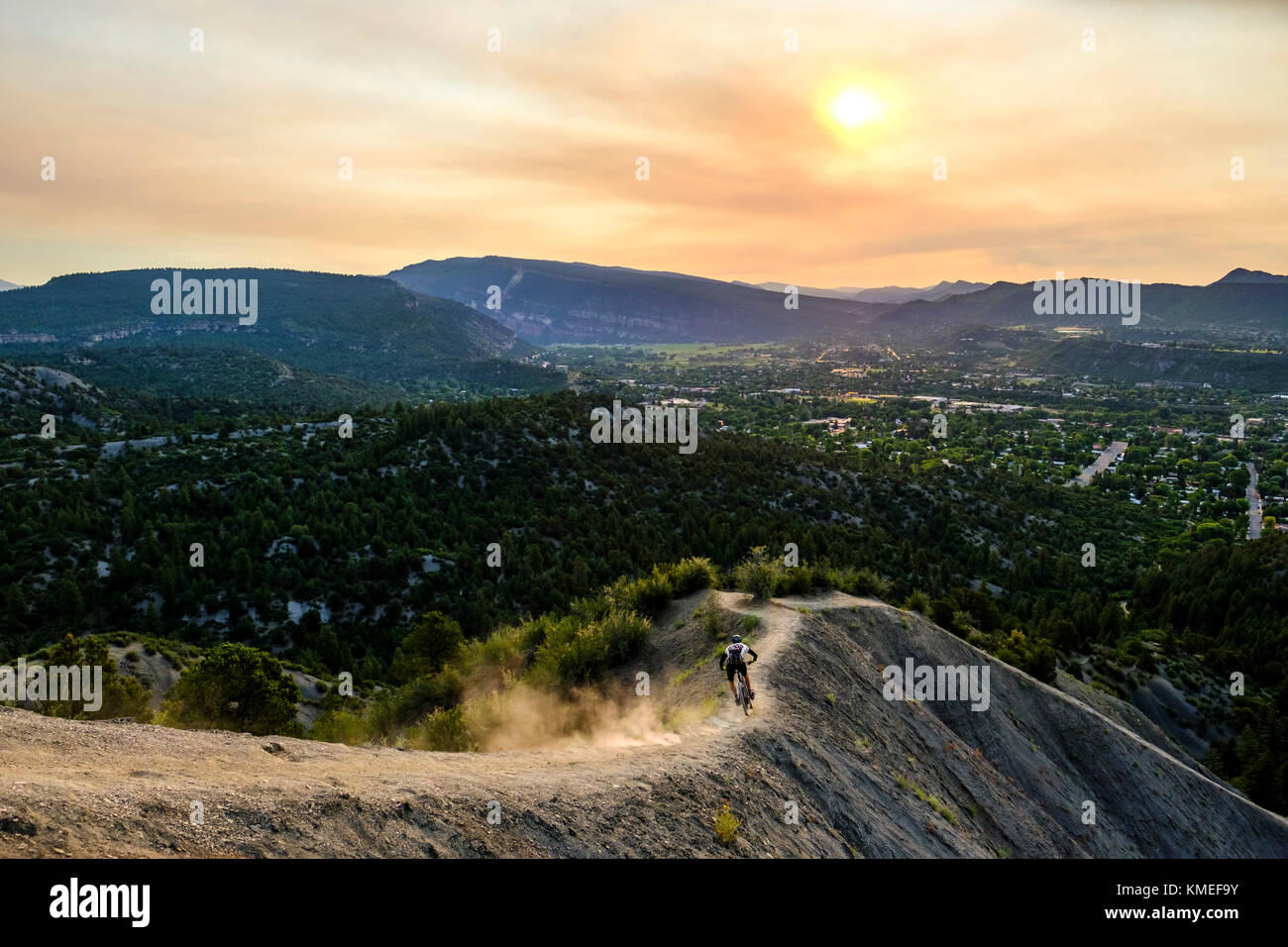 Male Mountain Biker in scenic landscape rides down Hogs back near ...