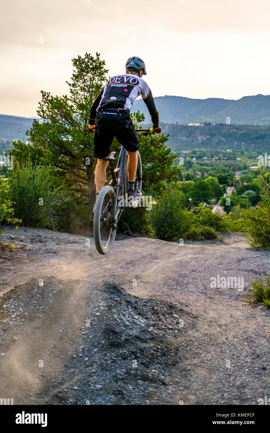 Male Mountain Biker in scenic landscape rides down Hogs back near ...