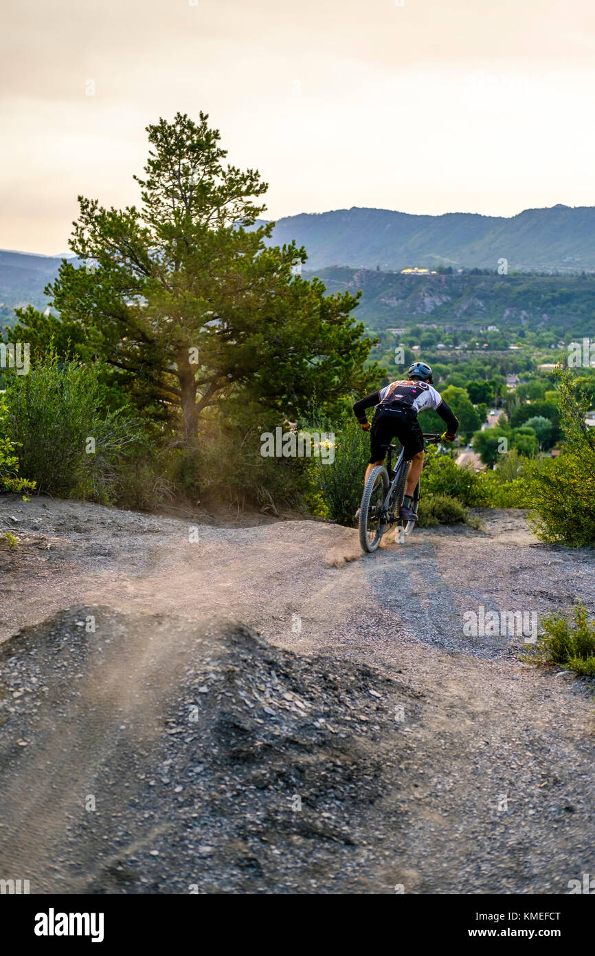 Male Mountain Biker in scenic landscape rides down Hogs back near ...