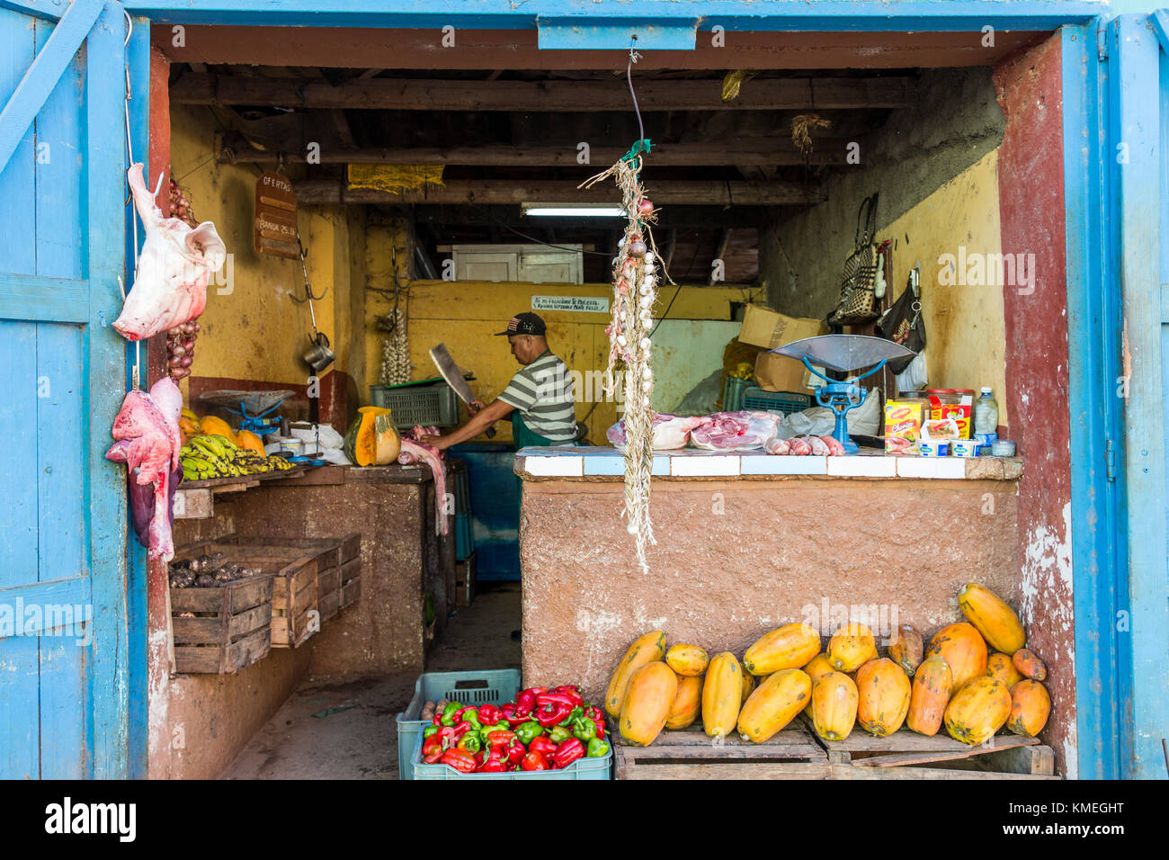 A butcher cuts meat at his shop in Trinidad,Cuba Stock Photo - Alamy
