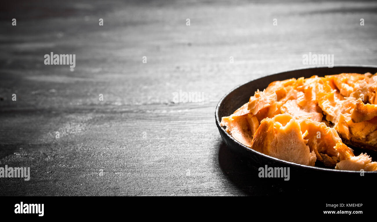 Fillet of fried trout on a plate . On the black chalkboard Stock Photo ...
