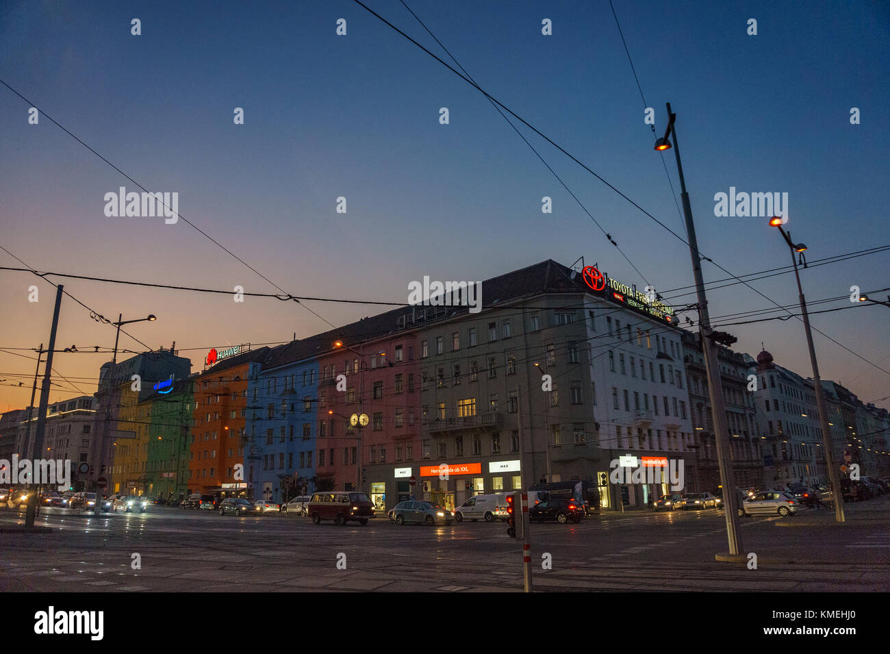 Architectural buildings and street traffic in a typical day in Vienna ...