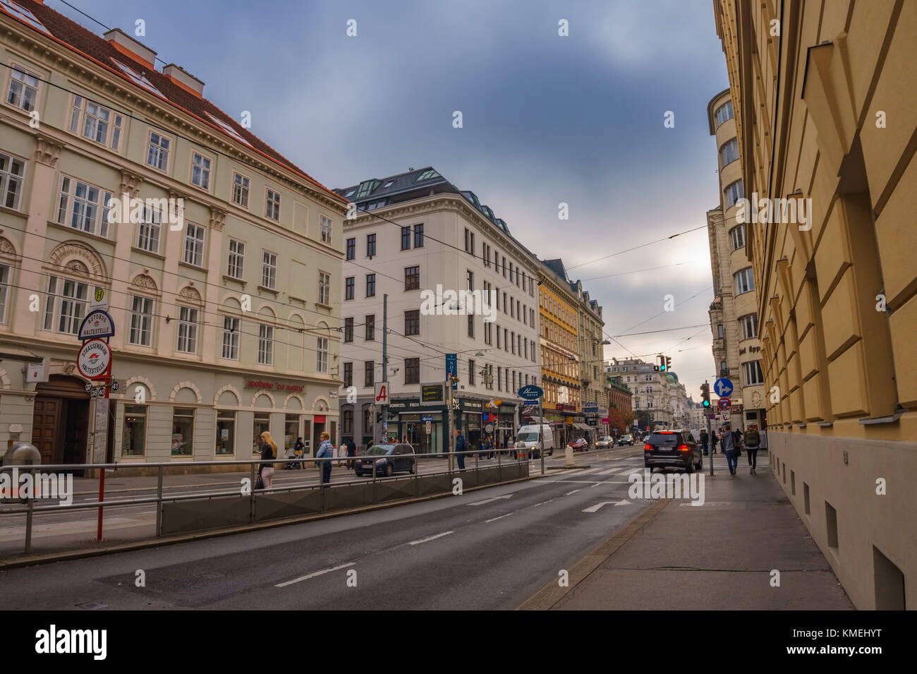 Architectural buildings and street traffic in a typical day in Vienna ...