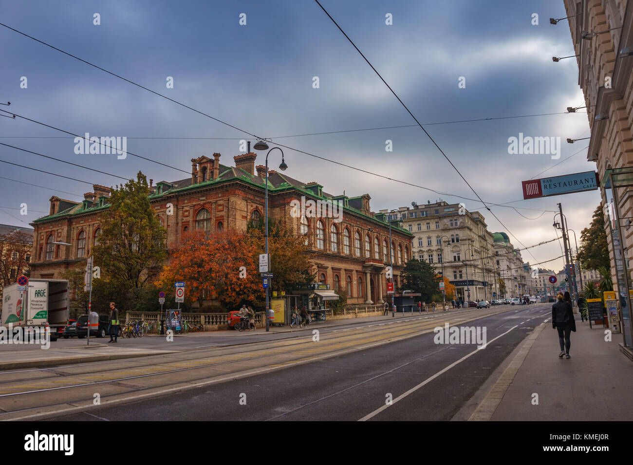 Architectural buildings and street traffic in a typical day in Vienna ...