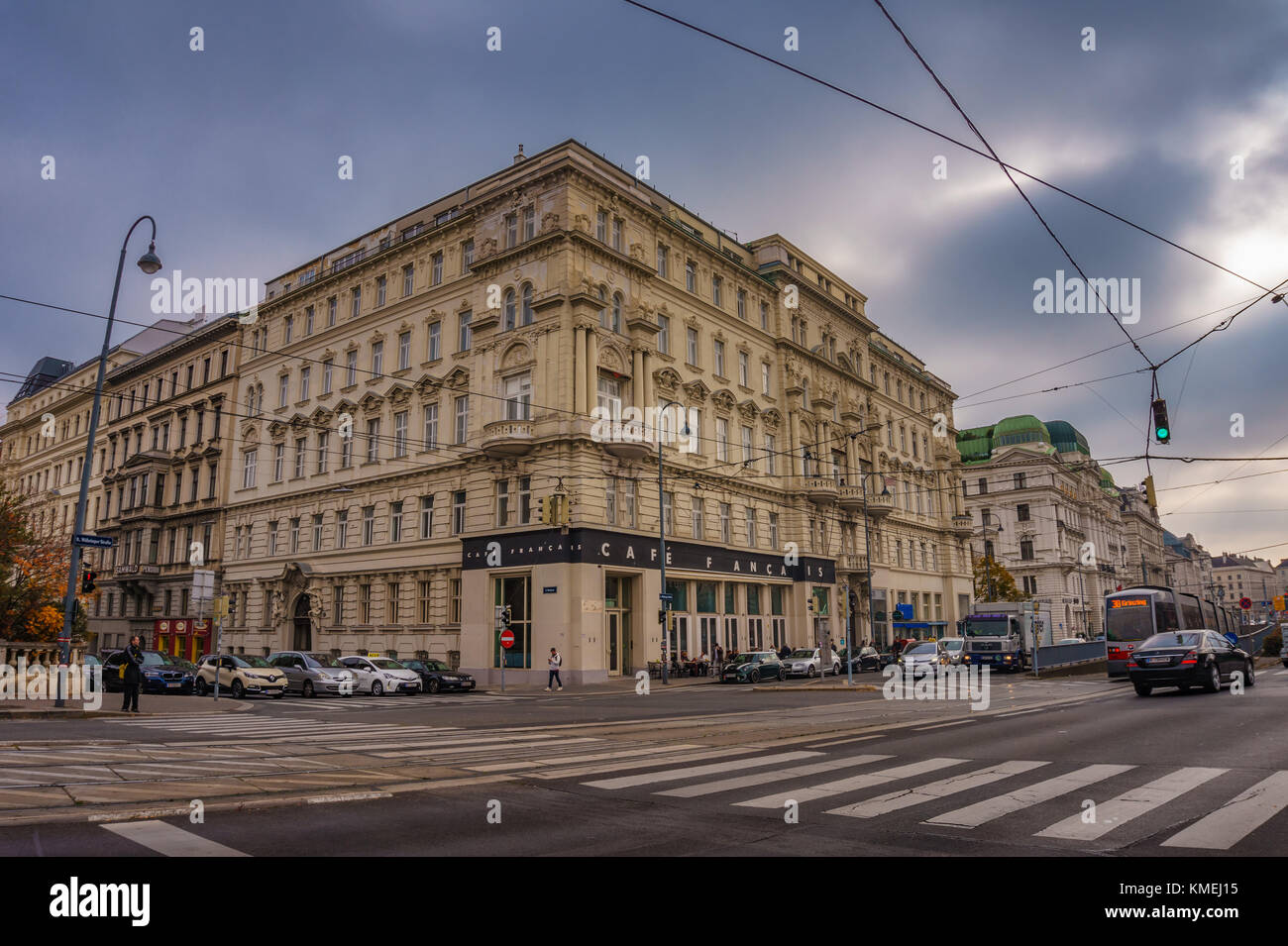 Architectural buildings and street traffic in a typical day in Vienna ...