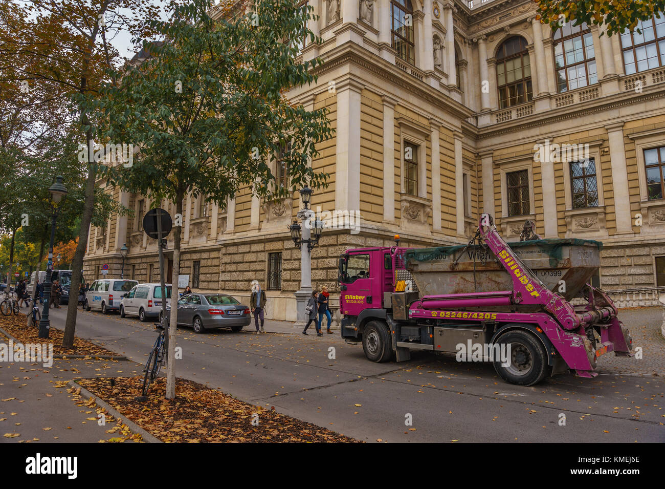 Architectural buildings and street traffic in a typical day in Vienna ...