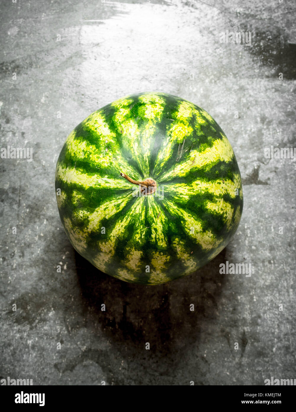 ripe fresh watermelon. On the stone table Stock Photo - Alamy