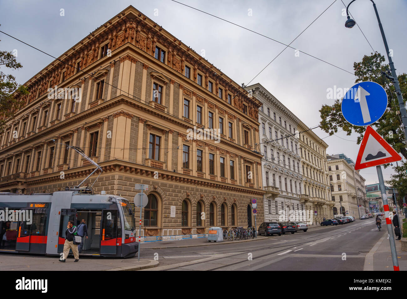 Architectural buildings and street traffic in a typical day in Vienna ...