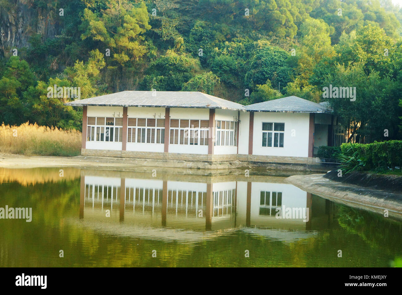 The landscape of the building at the side of the reservoir Stock Photo ...