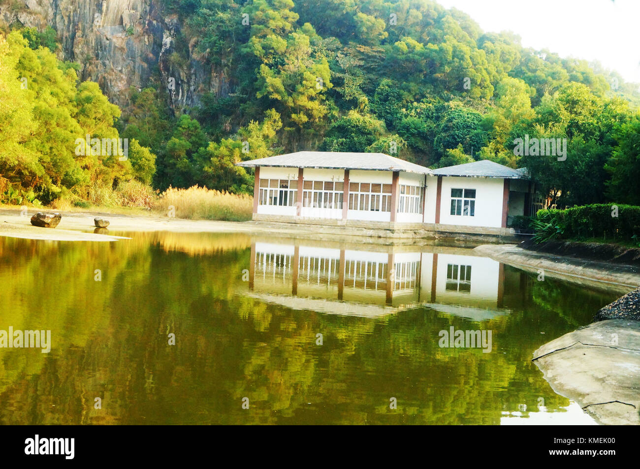 The landscape of the building at the side of the reservoir Stock Photo ...