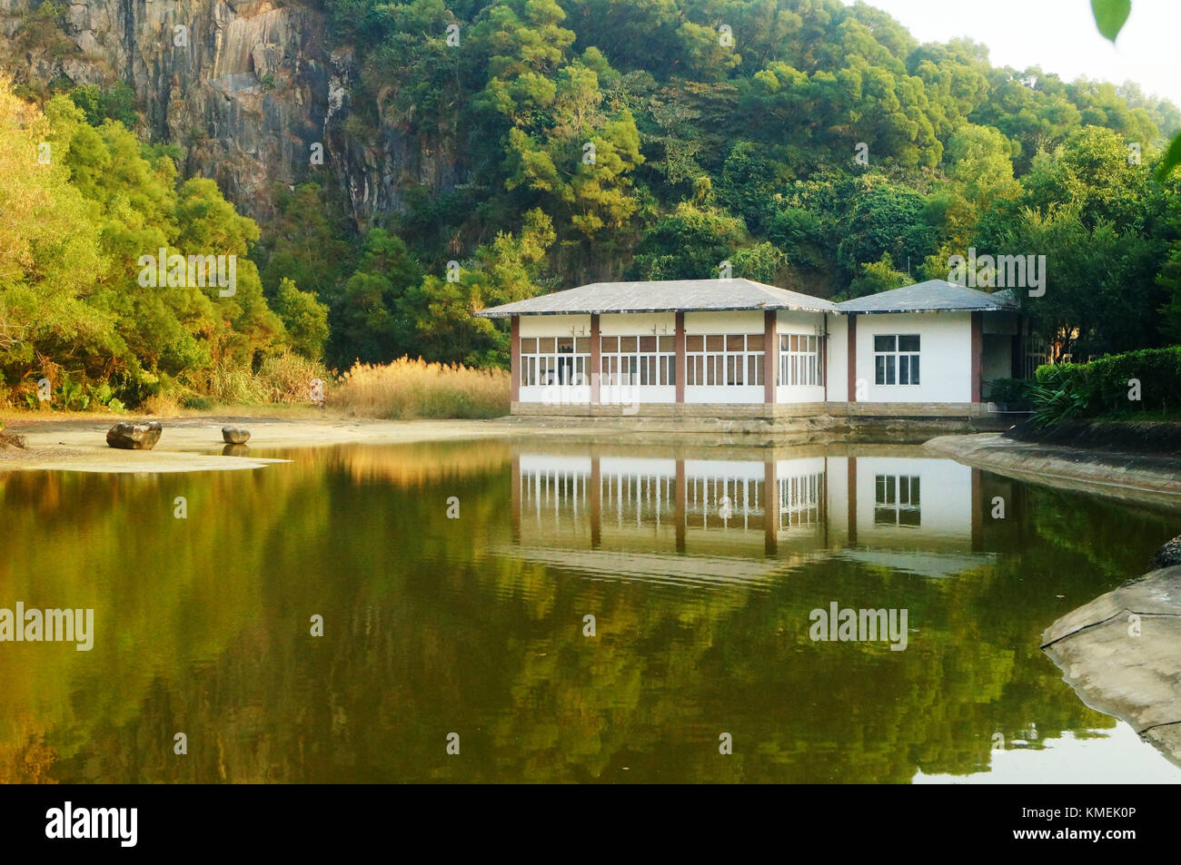 The landscape of the building at the side of the reservoir Stock Photo ...
