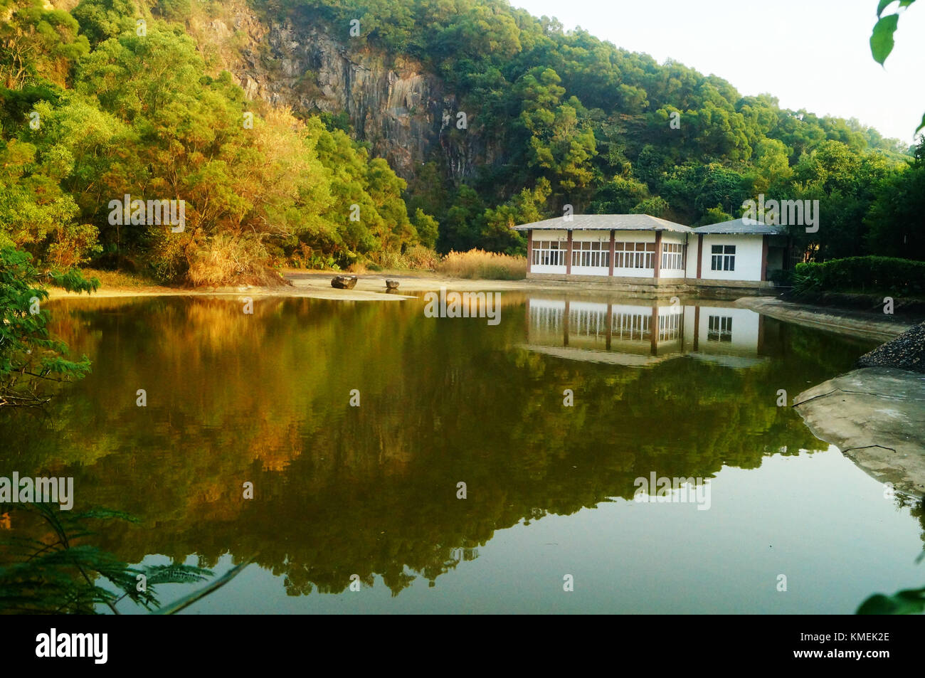 The landscape of the building at the side of the reservoir Stock Photo ...