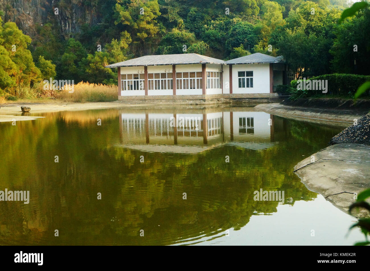 The landscape of the building at the side of the reservoir Stock Photo ...