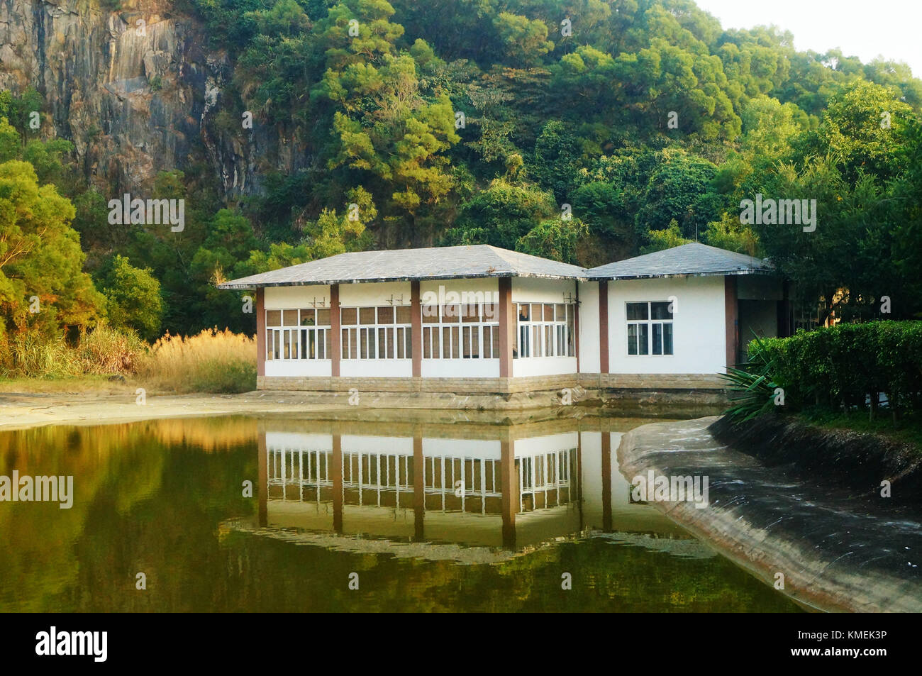 The landscape of the building at the side of the reservoir Stock Photo ...