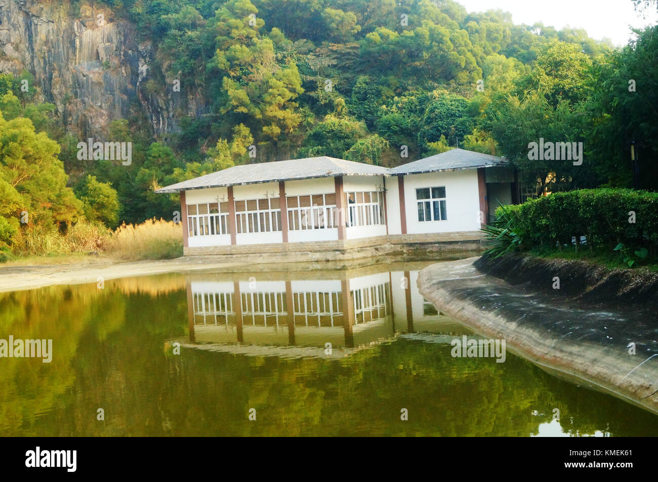The landscape of the building at the side of the reservoir Stock Photo ...