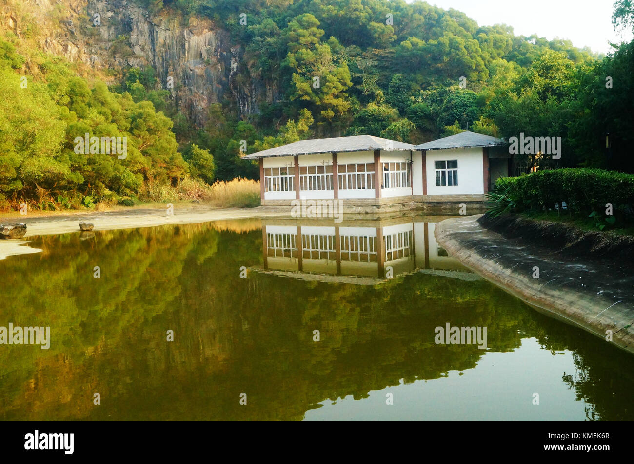 The landscape of the building at the side of the reservoir Stock Photo ...