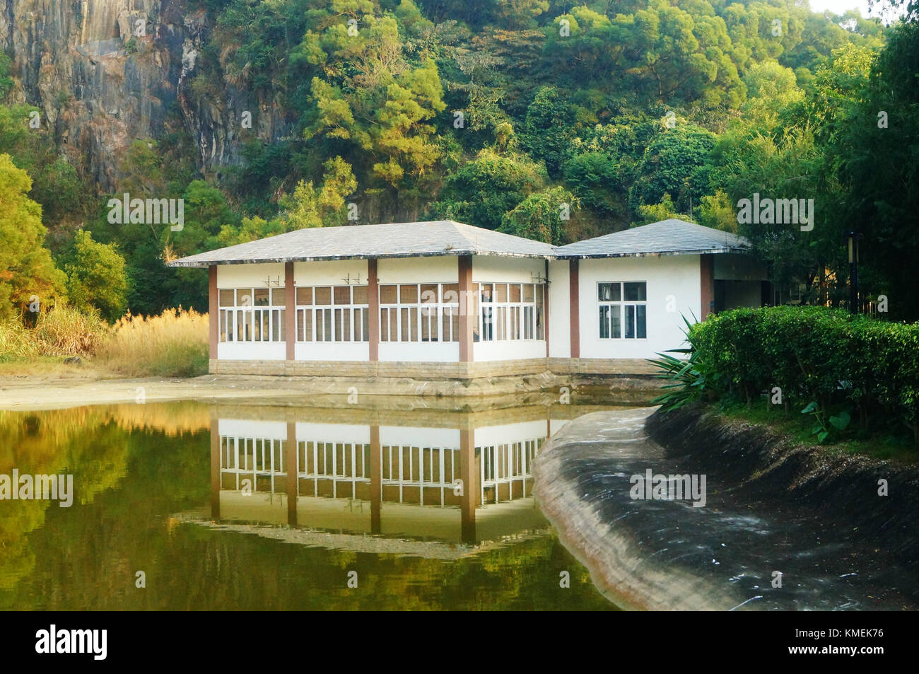 The landscape of the building at the side of the reservoir Stock Photo ...
