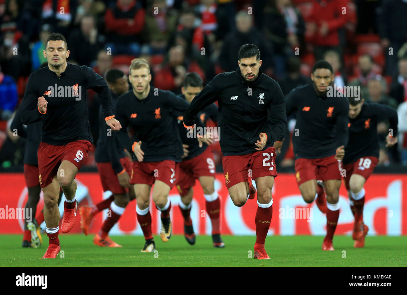 Liverpool's Emre Can (centre right) warms up prior to the UEFA ...