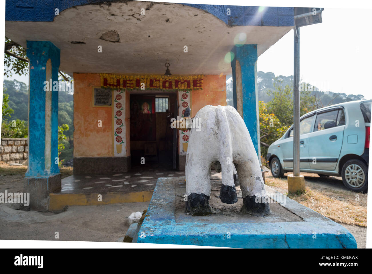 A Hindu temple with Welcome board at the entrance Stock Photo - Alamy