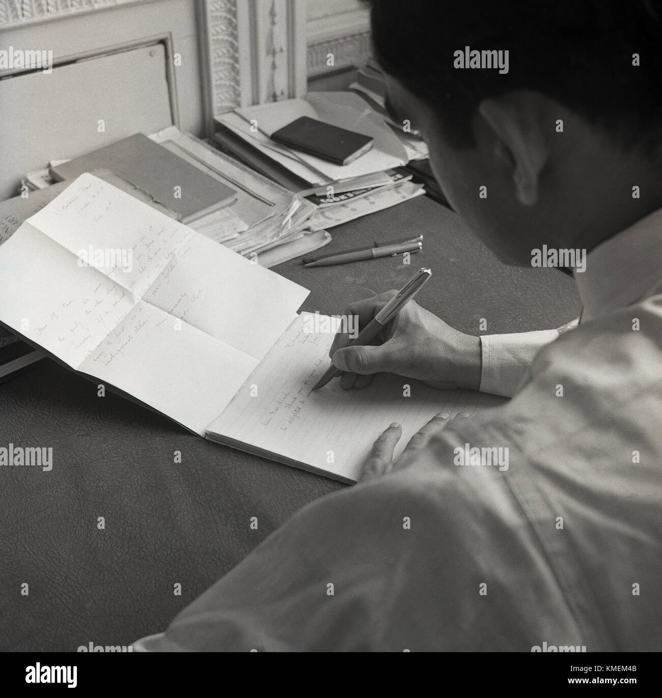 1950s, historical, written correspondence, a man writing a thank you ...