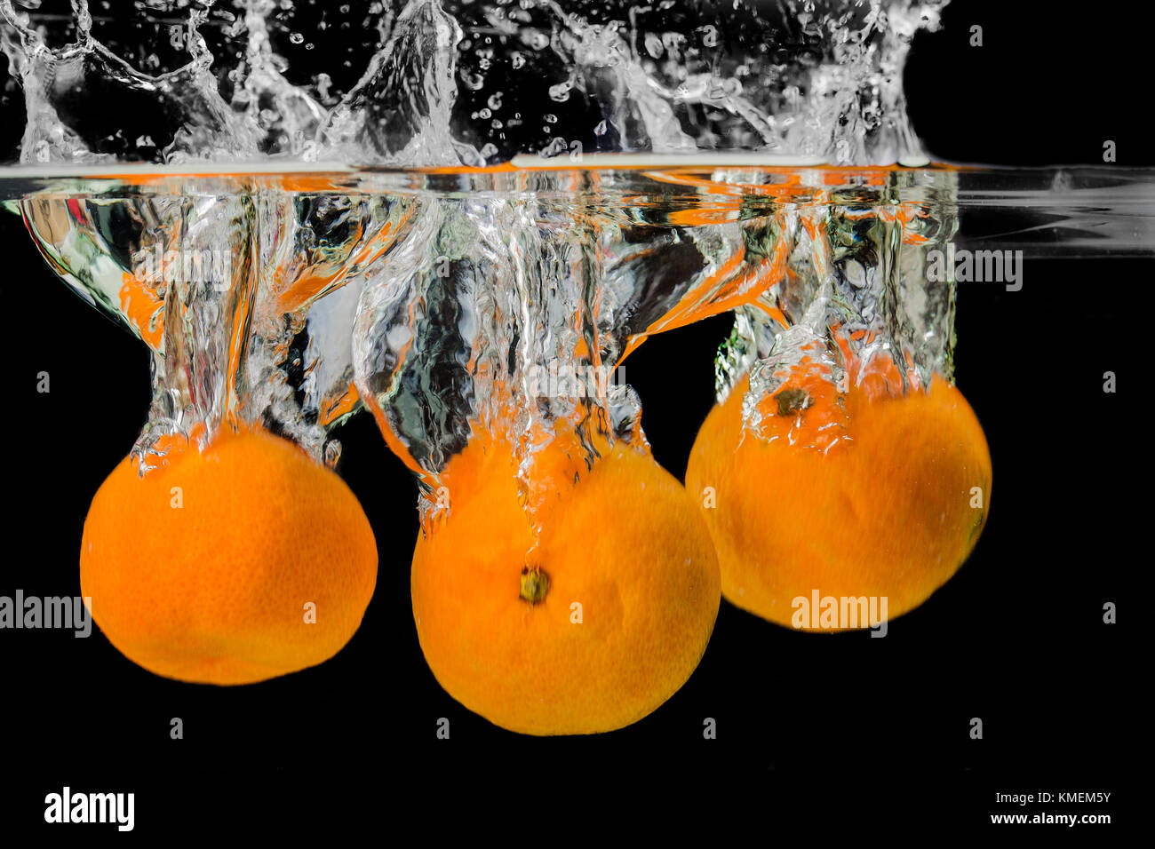 Mandarin water splash black hi-res stock photography and images - Alamy