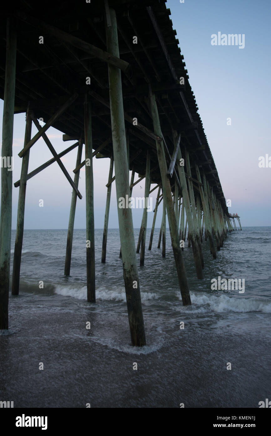 North Carolina ocean view from under pier Stock Photo - Alamy