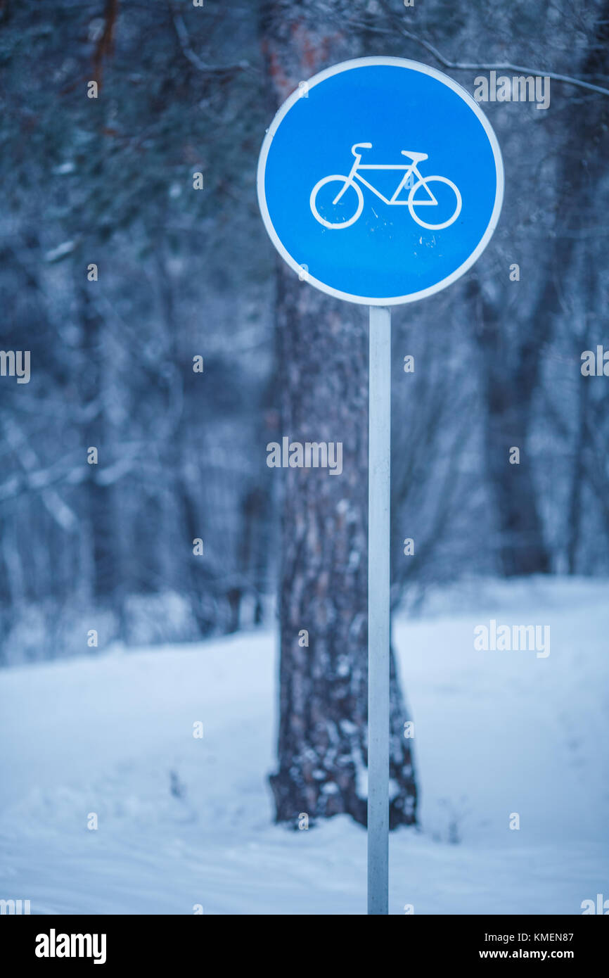 Winter trees with road sign Stock Photo - Alamy