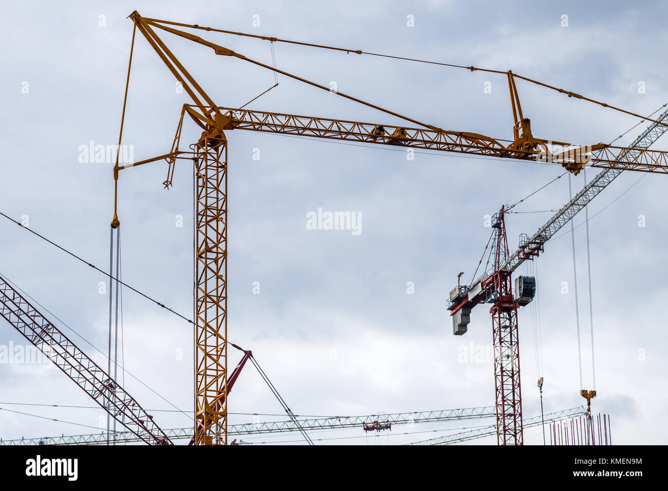 Crains on construction site of building Stock Photo - Alamy
