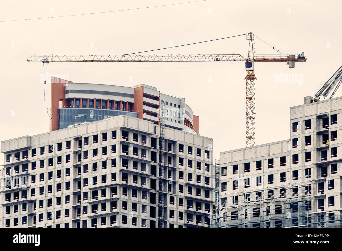 Crains on construction site of building Stock Photo - Alamy