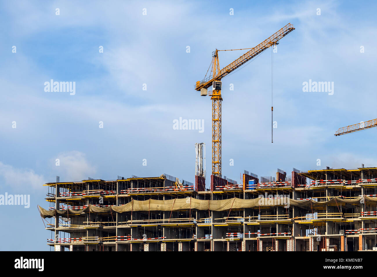 Crains on construction site of building Stock Photo - Alamy
