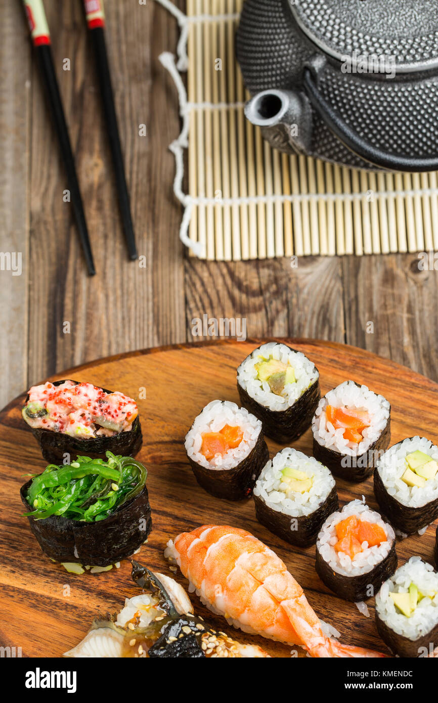 Rolls with avocado and tuna, sushi, gunkan in set Stock Photo - Alamy