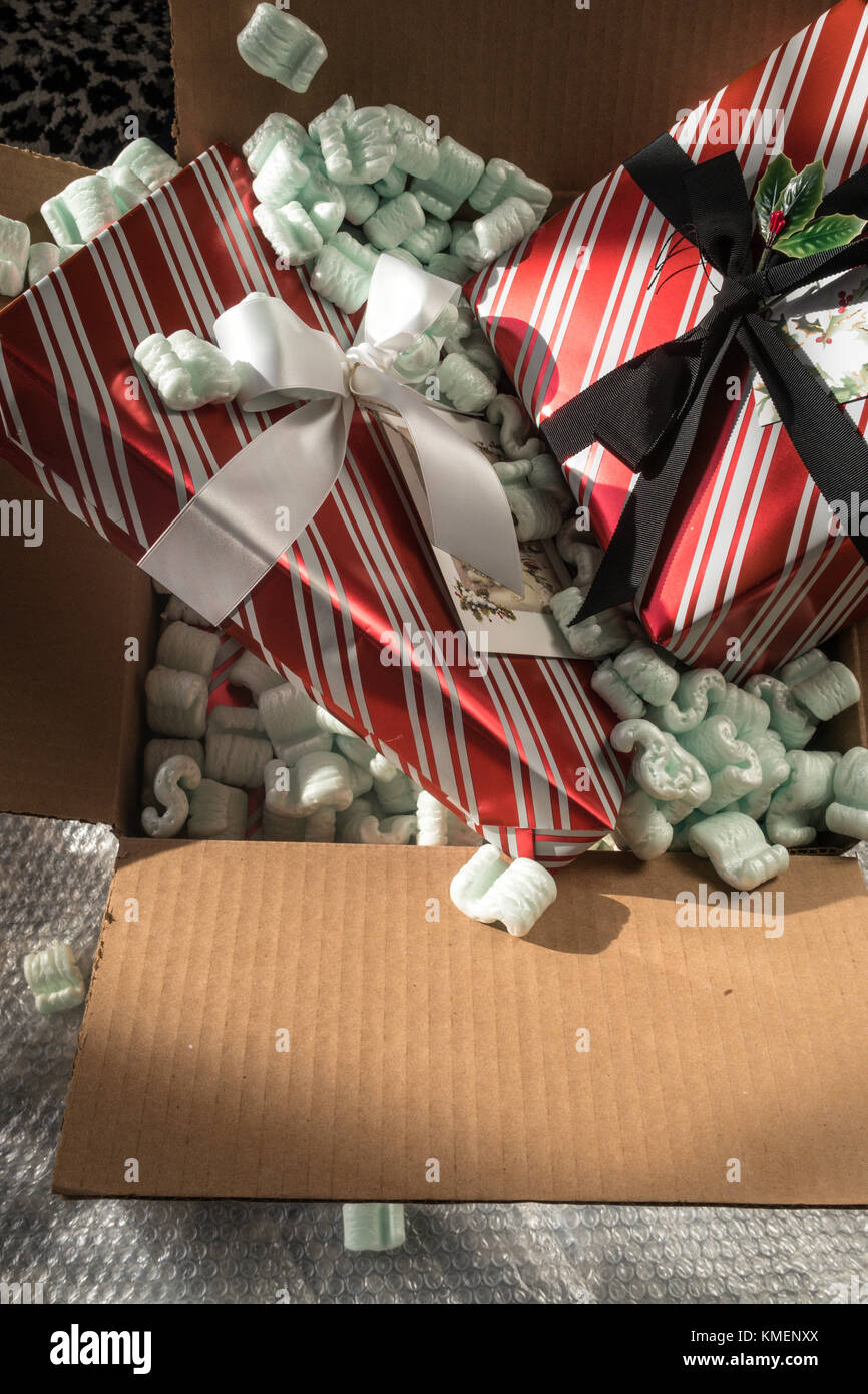 Wrapped Christmas Presents in Packing Box, USA Stock Photo - Alamy