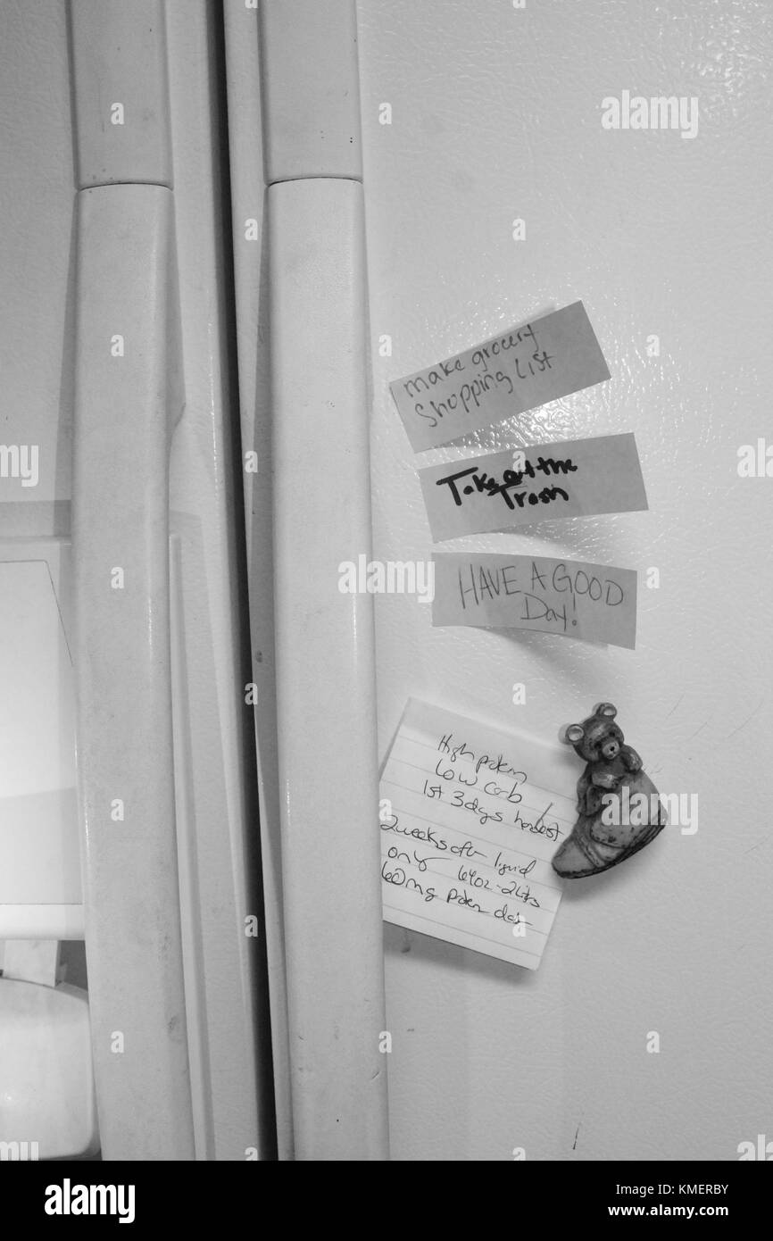 Sticky notes on fridge Stock Photo - Alamy