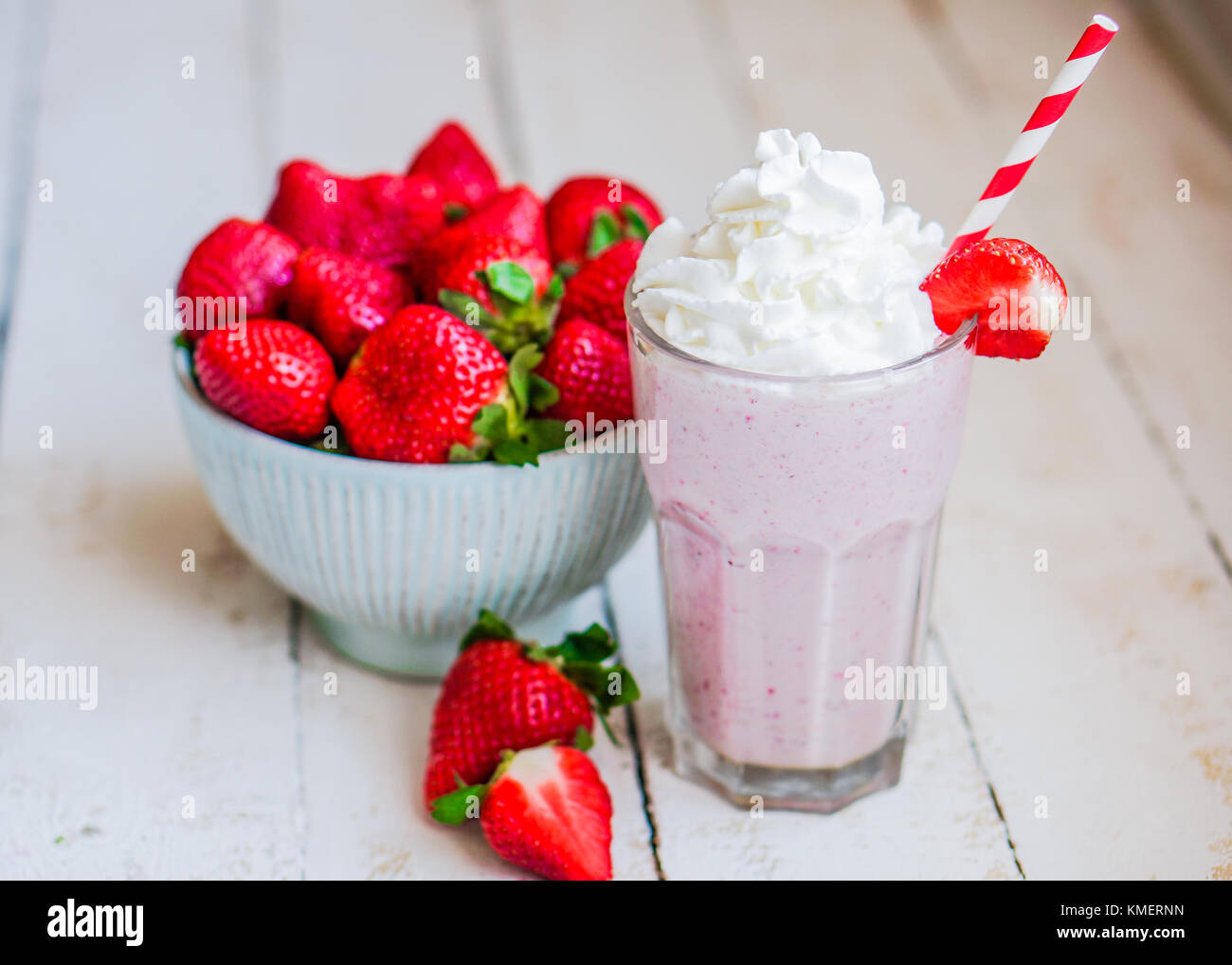 Strawberry Milkshake On Wooden Background Stock Photo - Alamy
