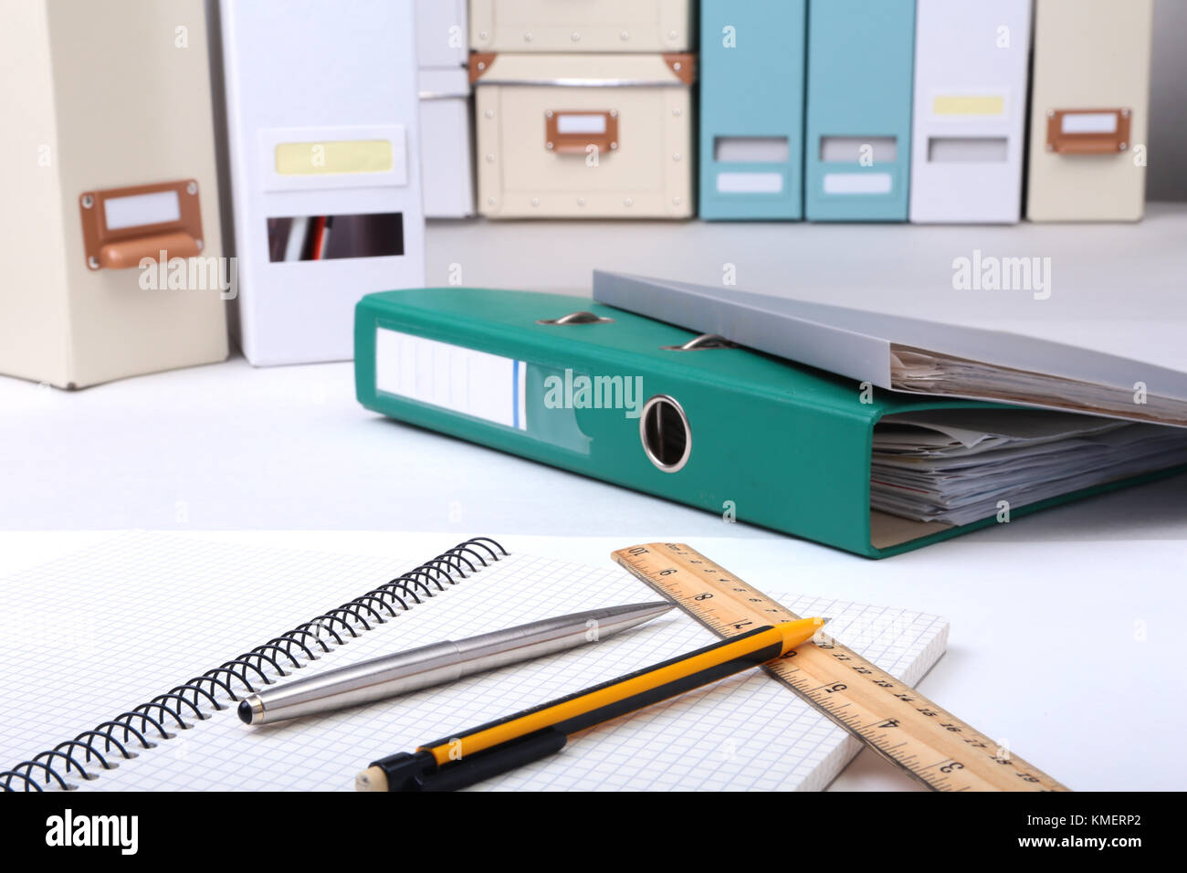 Folder file, pen, pencil and note on the desk. blurred background Stock ...
