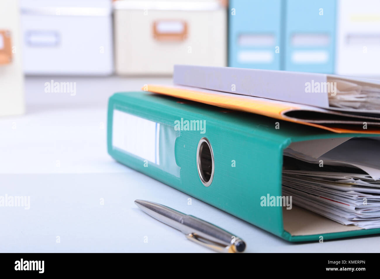 Folder file, pen, pencil and note on the desk. blurred background Stock ...