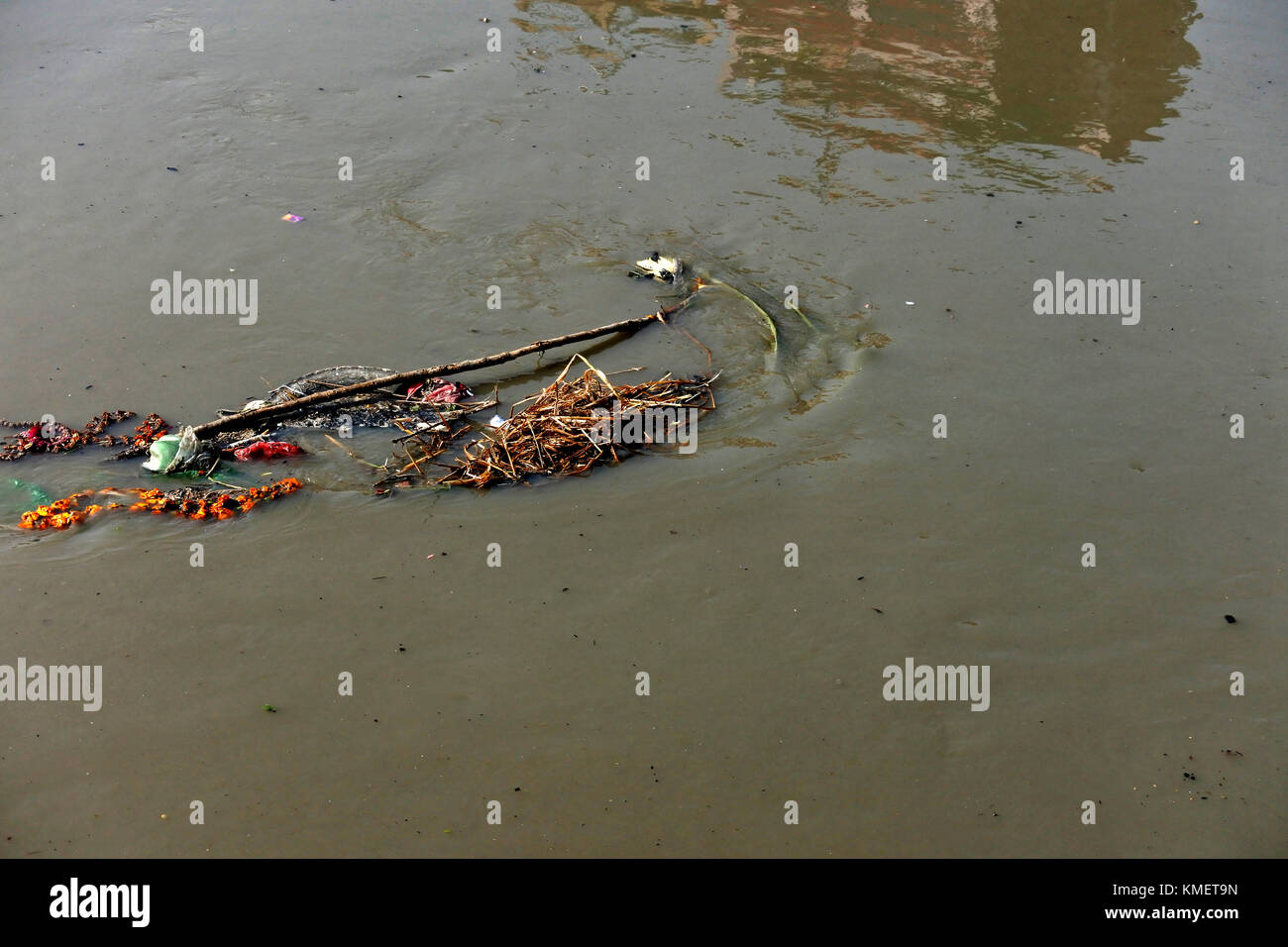 Plastic stuck in a river and accumulating Stock Photo - Alamy