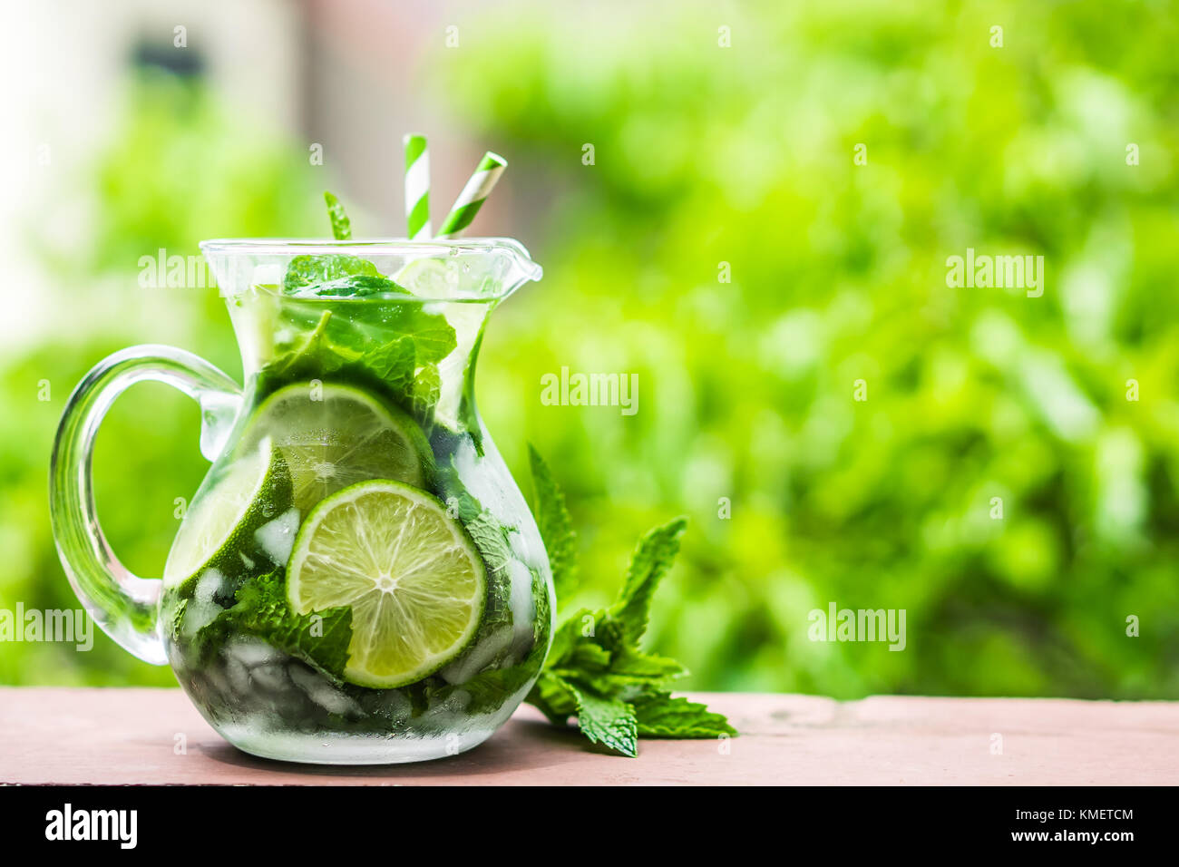 Glass of mohito outside Stock Photo - Alamy